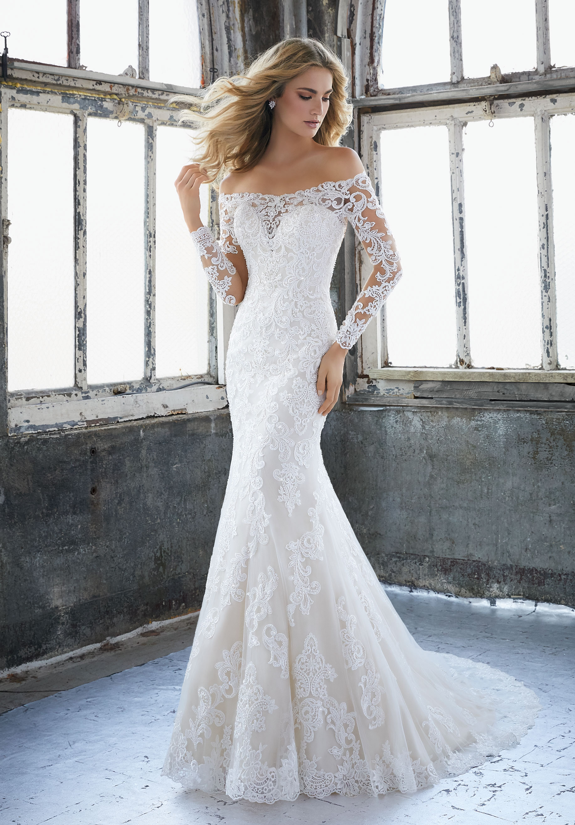 Wedding dress style 8207 by Mori Lee. Elegant Fit and Flare